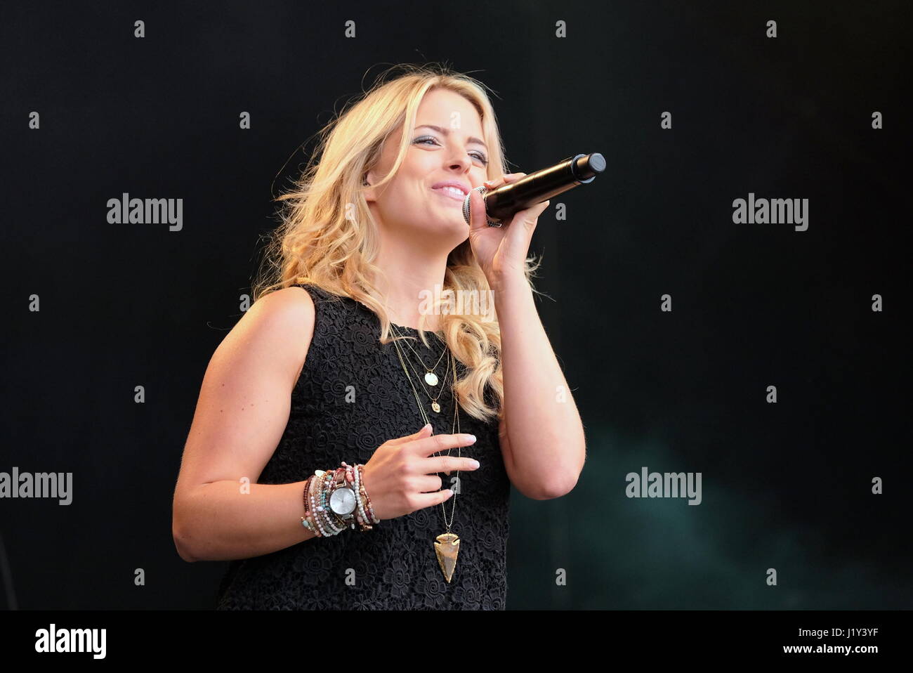 Crissie Rhodes with British country music duo The Shires performing at ...