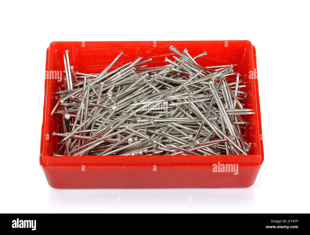 Nail in box isolated on the white background Stock Photo - Alamy