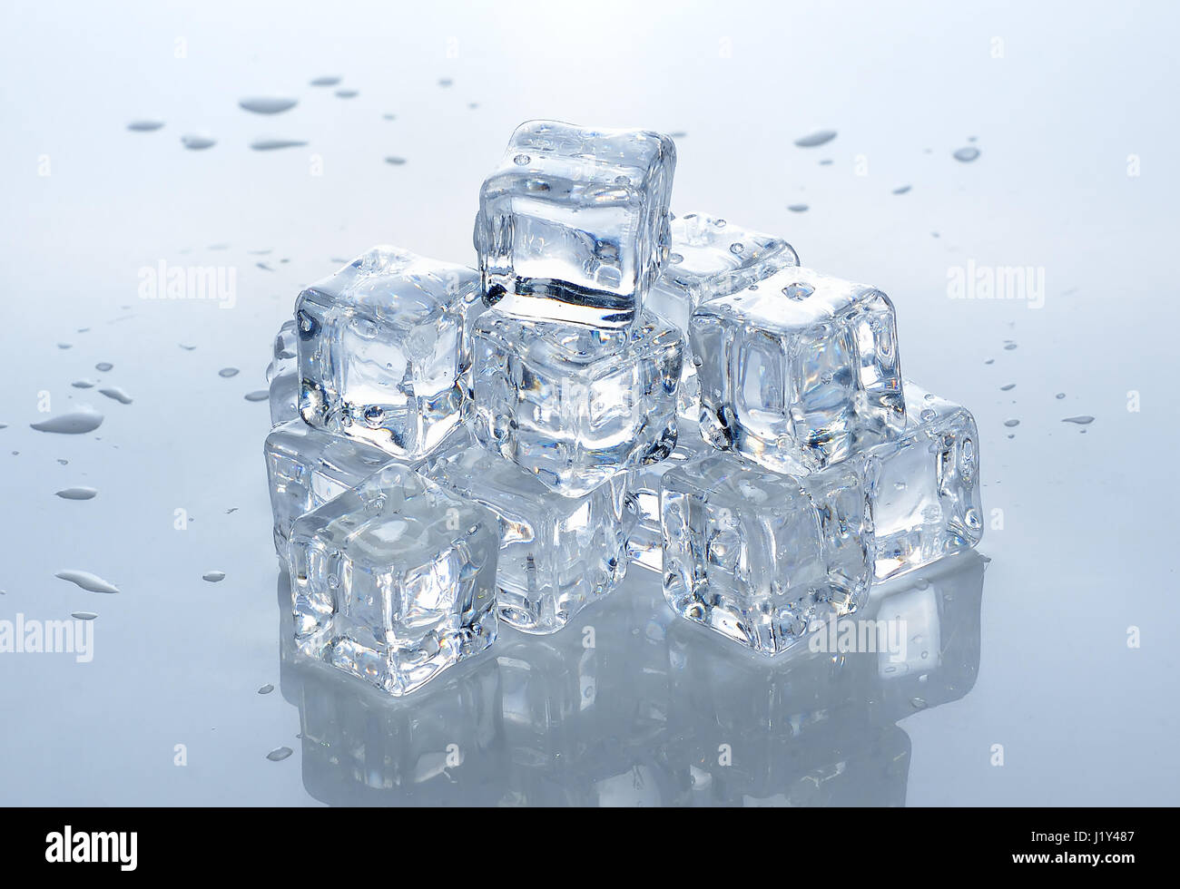 Square ice cubes on white background Stock Photo - Alamy