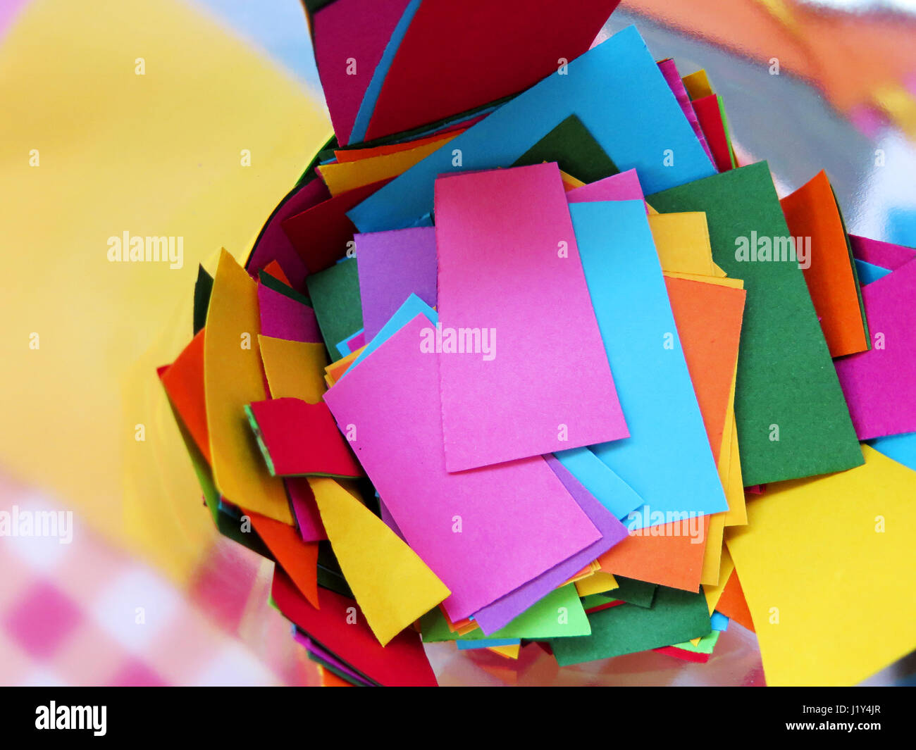 Pieces of colored paper - abstract background Stock Photo - Alamy