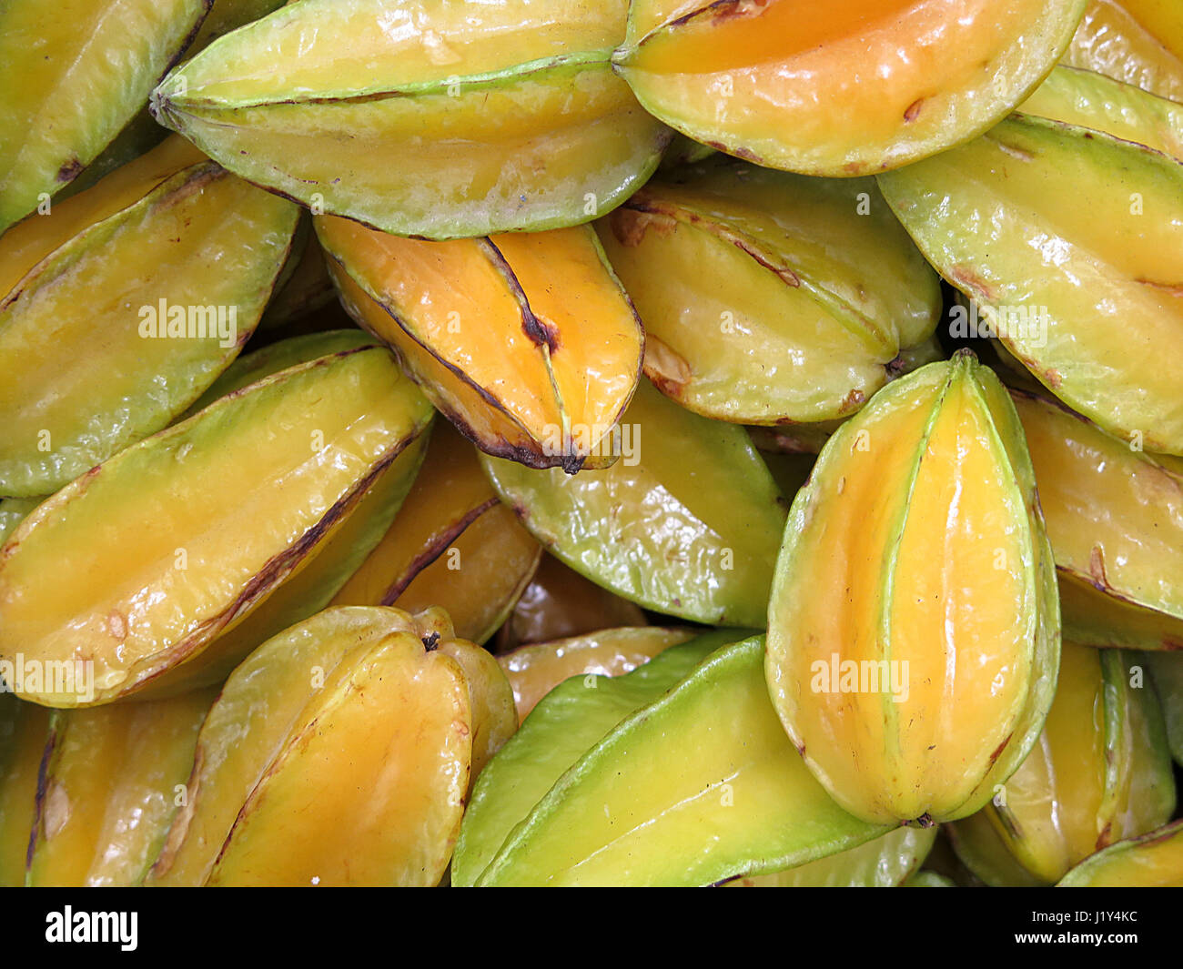 carambola fruit background, delicious tropical fruit Stock Photo - Alamy