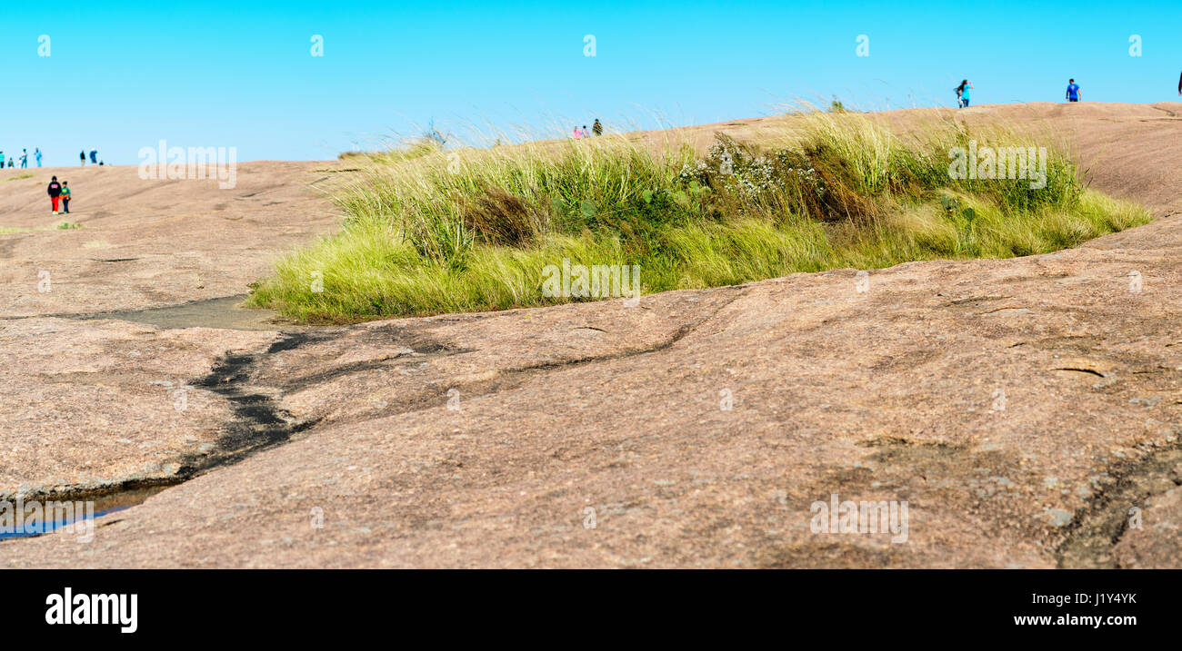 Red granite of Enchanted Rock near the Edwards Plateau in the Texas ...