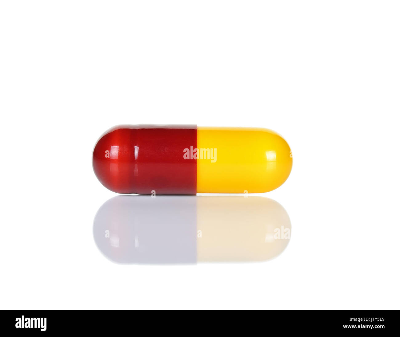Pill capsule isolated on the white background Stock Photo - Alamy