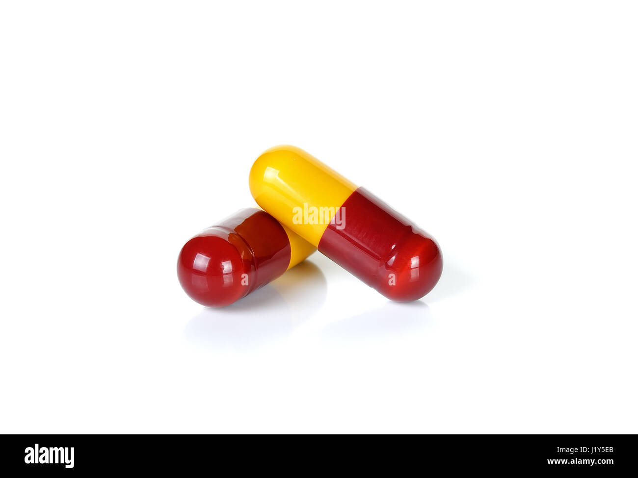 Pill capsule isolated on the white background Stock Photo - Alamy