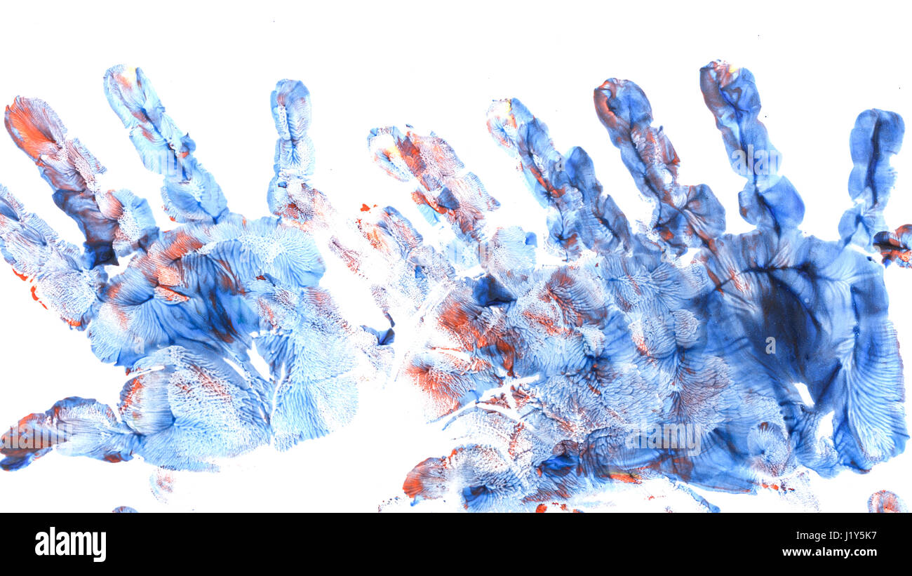 Red and blue imprint of children's hands gouache. Imposition of prints ...
