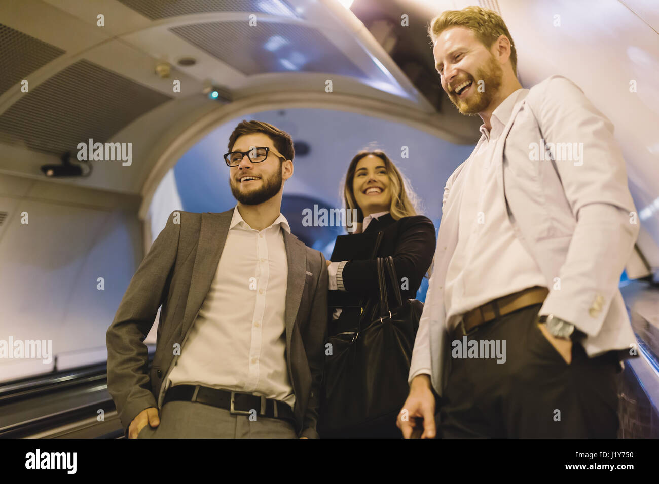 Business colleagues rush to catch subway after work Stock Photo - Alamy