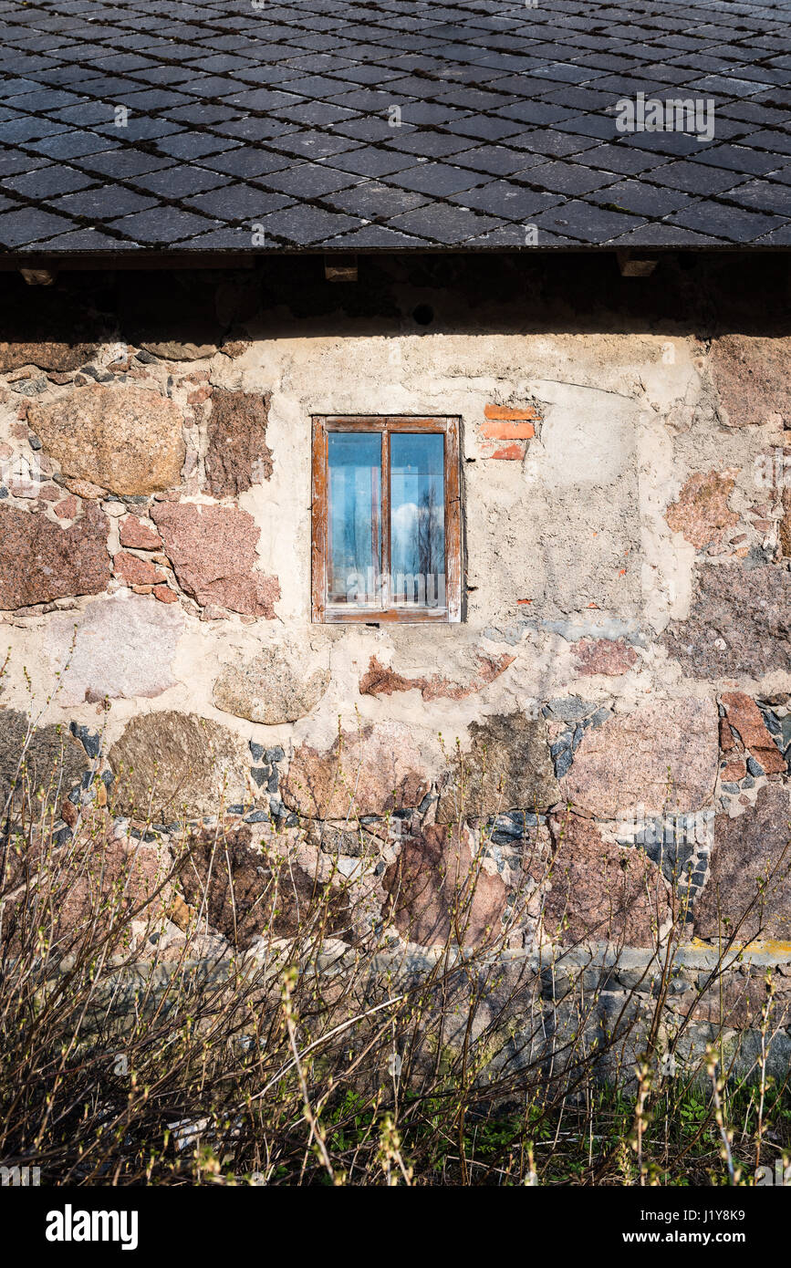 old rock building in latvia countryside with window Stock Photo - Alamy