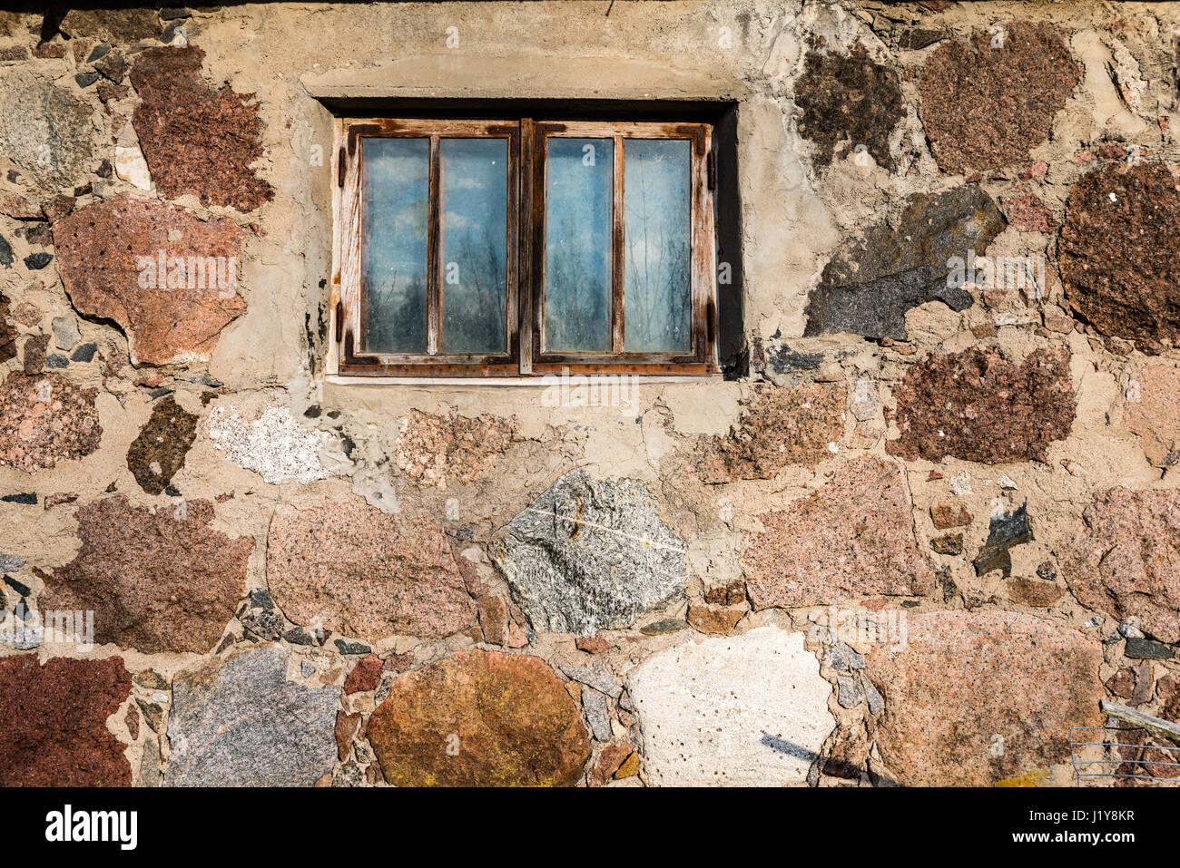 old rock building in latvia countryside with window Stock Photo - Alamy