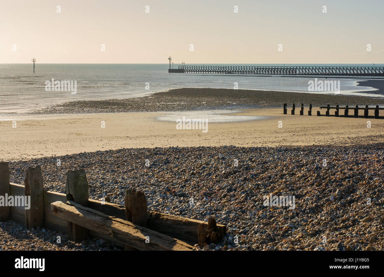Sand and shingle beach with groynes at Littlehampton, West Sussex ...