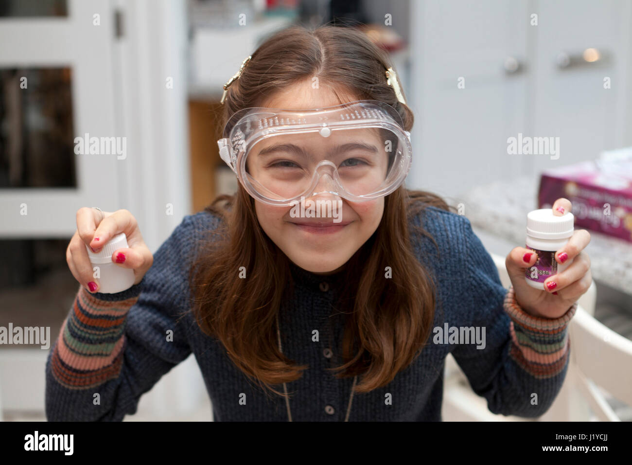 happy young girl after receiving Christmas gifts Stock Photo - Alamy