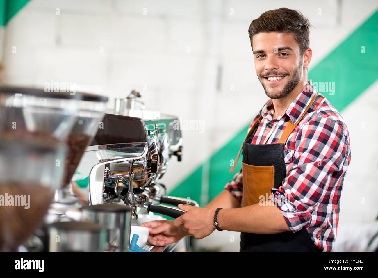 Waiter pouring coffee hi-res stock photography and images - Alamy