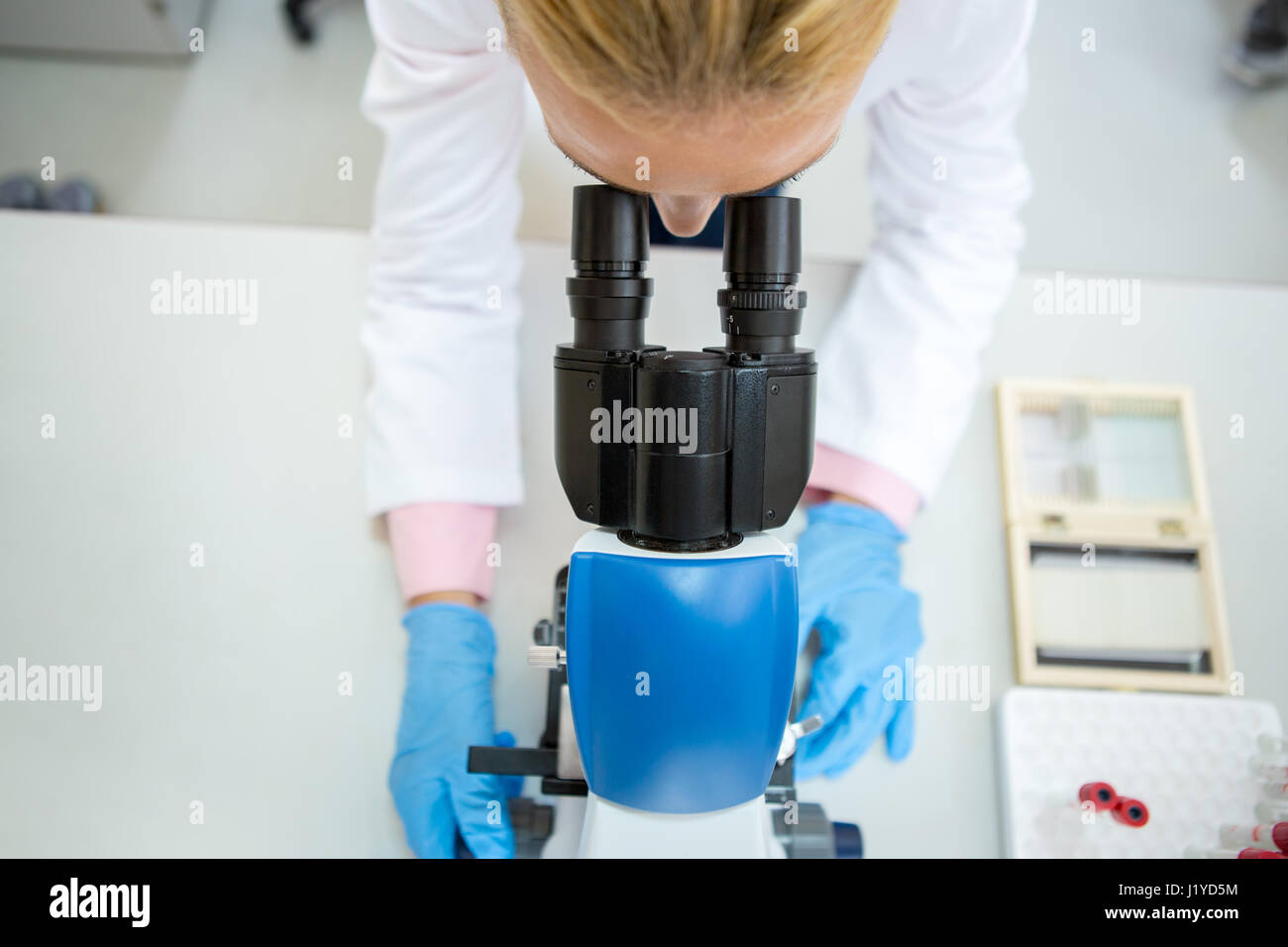 Female chemist microscope in hi-res stock photography and images - Alamy