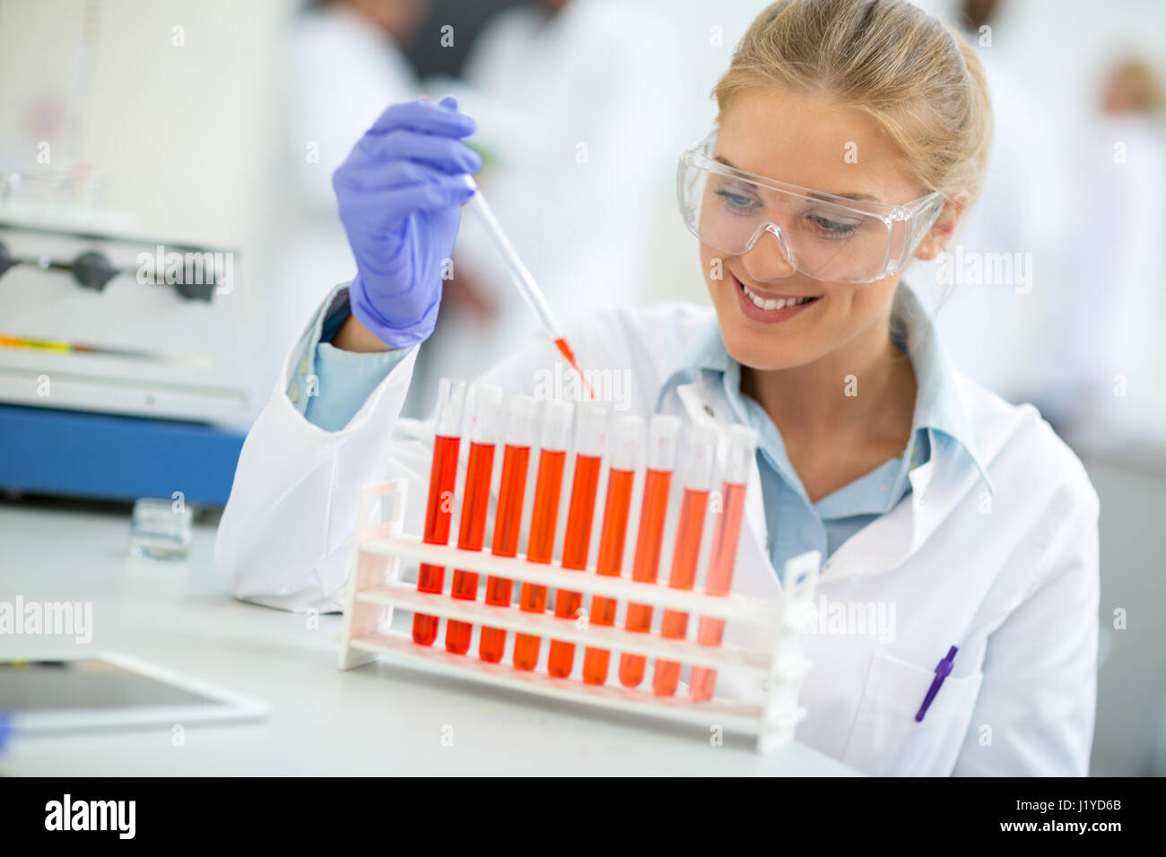 Using test tubes hi-res stock photography and images - Alamy