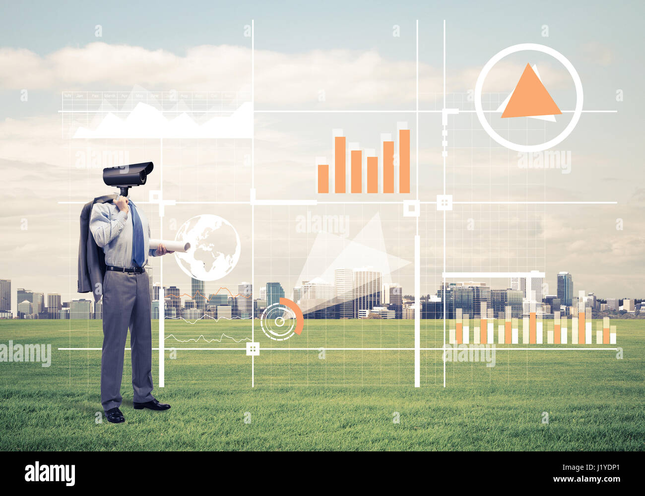 Camera headed man standing on green grass against modern citysca Stock ...