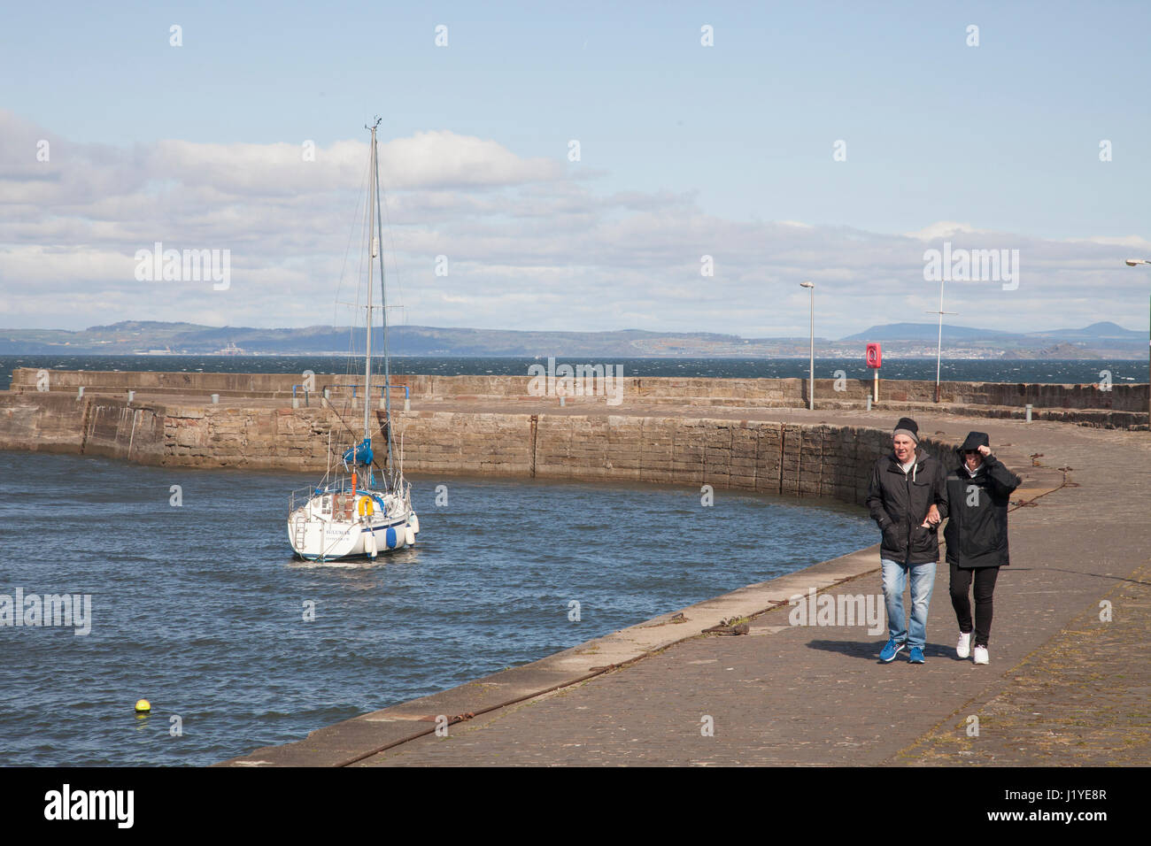 Musselburgh promenade, Edinburgh, Scotland, UK. Couple walking on ...
