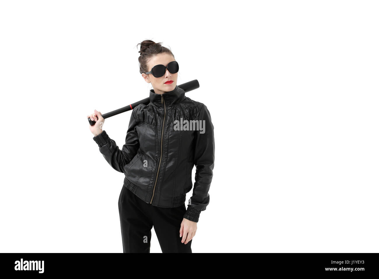 Portrait of an angry woman with a bat, isolated on white background ...