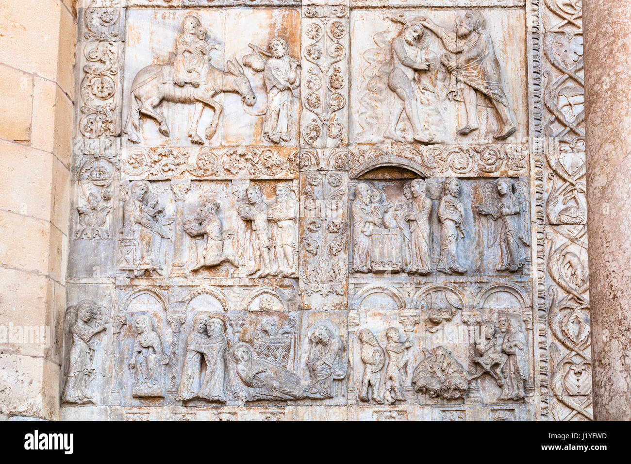 travel to Italy - medieval outdoor bas-relief of portal of Basilica di ...