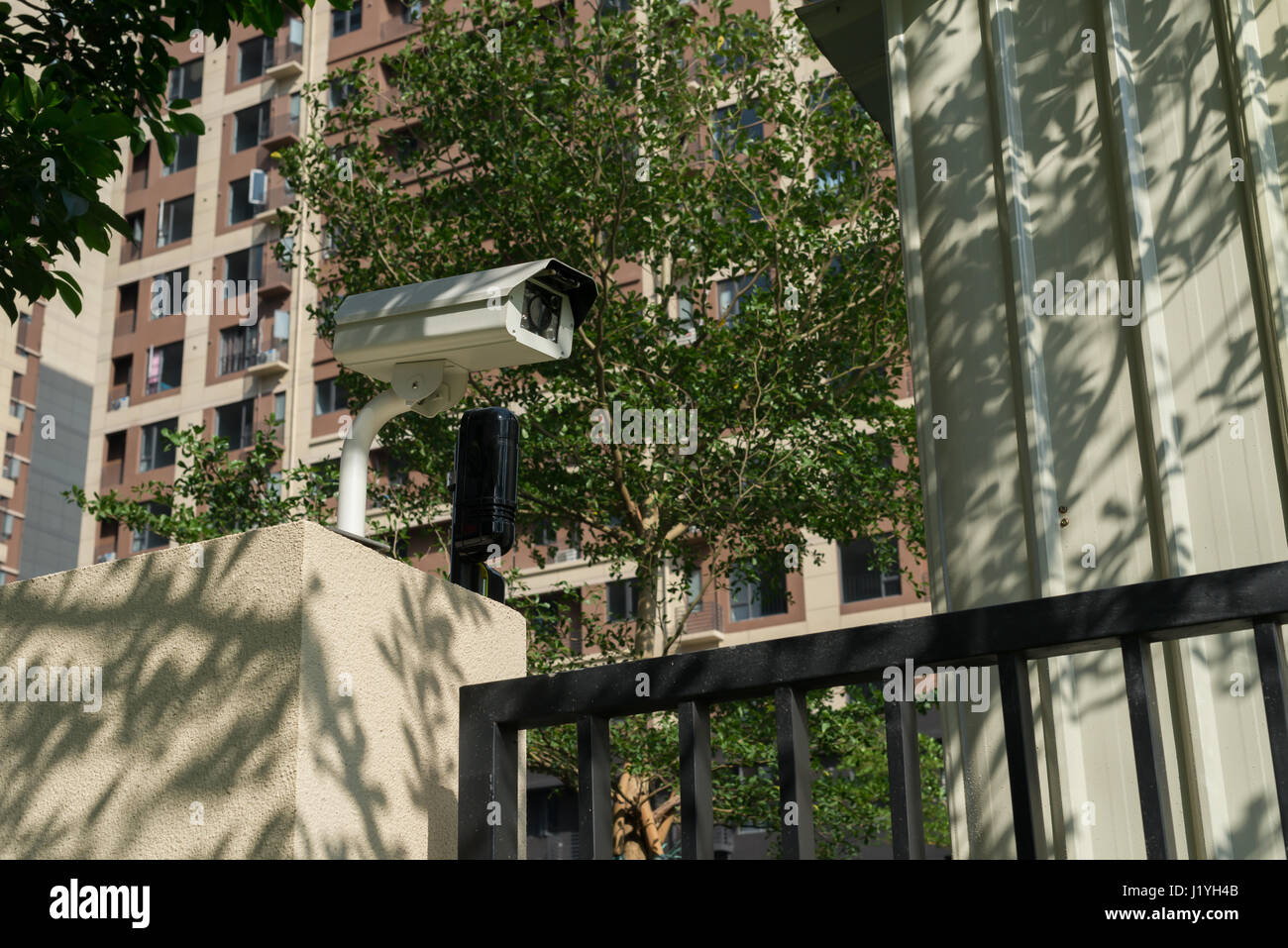 CCTV camera in front of a residential building Stock Photo - Alamy