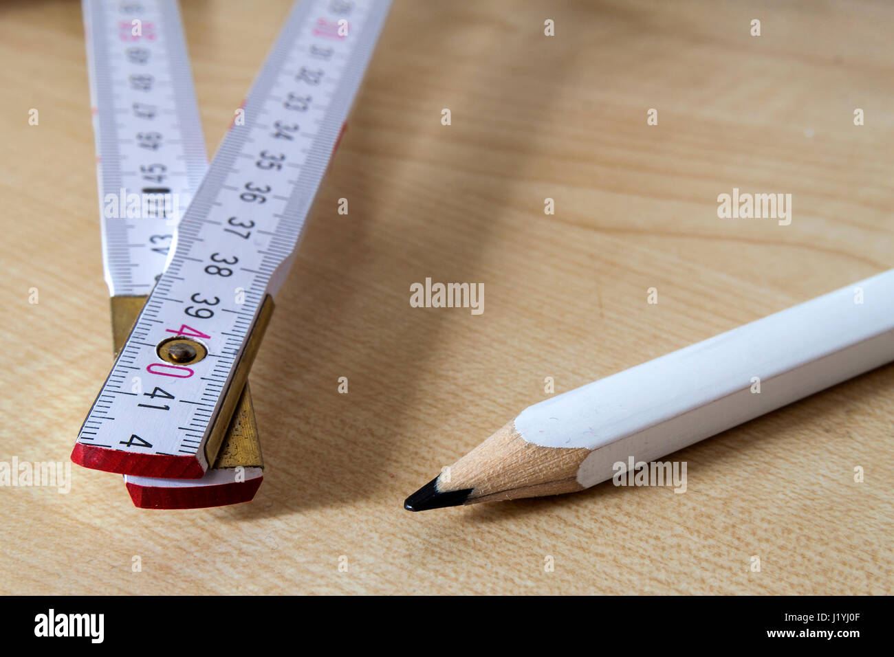Measuring tape meter and pensil. Construction tools Stock Photo - Alamy