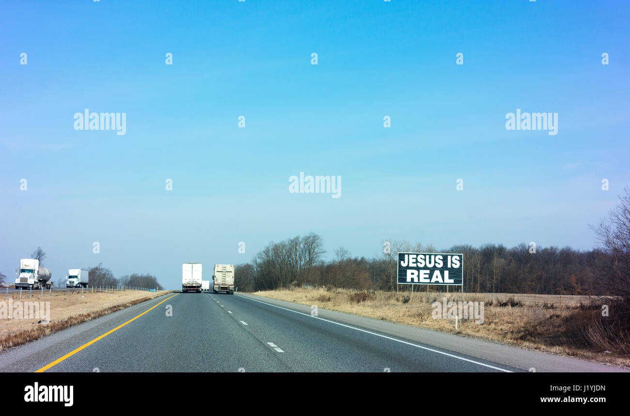 Sign declaring "Jesus is real" on I65 in Indiana with trucks travelling ...