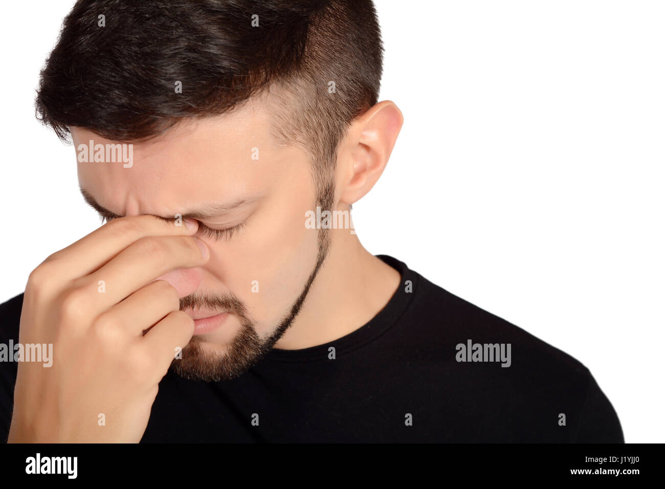 Portrait of a young sad man. Isolated white background Stock Photo - Alamy