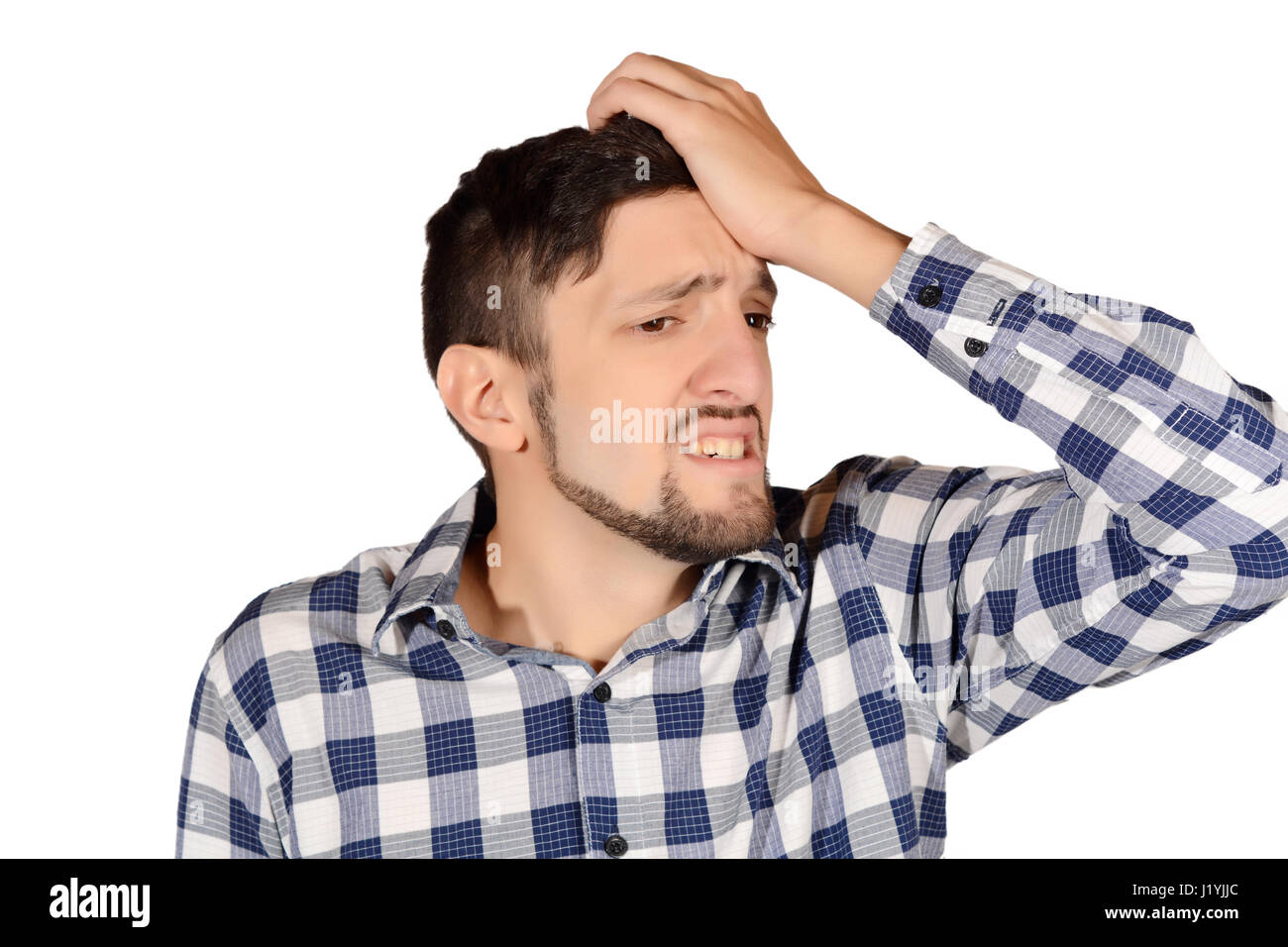 Portrait of a young man worried. Isolated white background Stock Photo ...