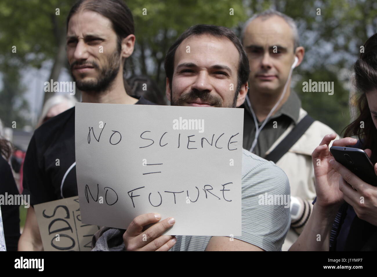 Paris, France. 22nd Apr, 2017. An activist caries a sign that reads 'No ...