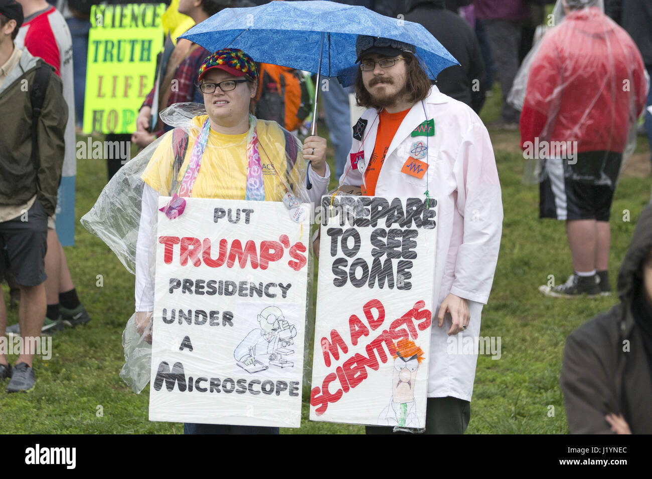 Washington, District Of Columbia, USA. 22nd Apr, 2017. Protesters wear ...