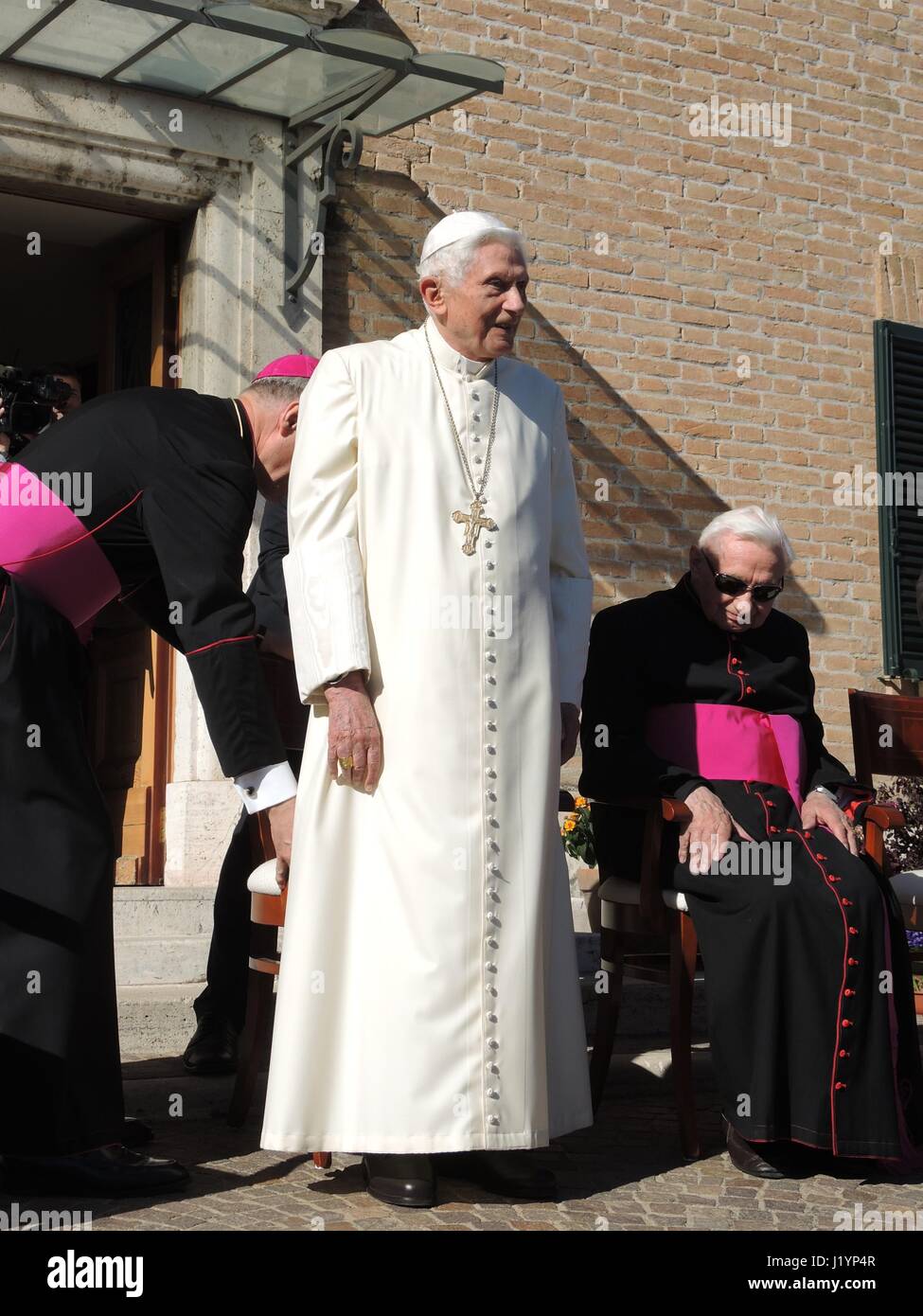 Pope Emeritus Benedict XVI, born Joseph Ratzinger, stands by the ...