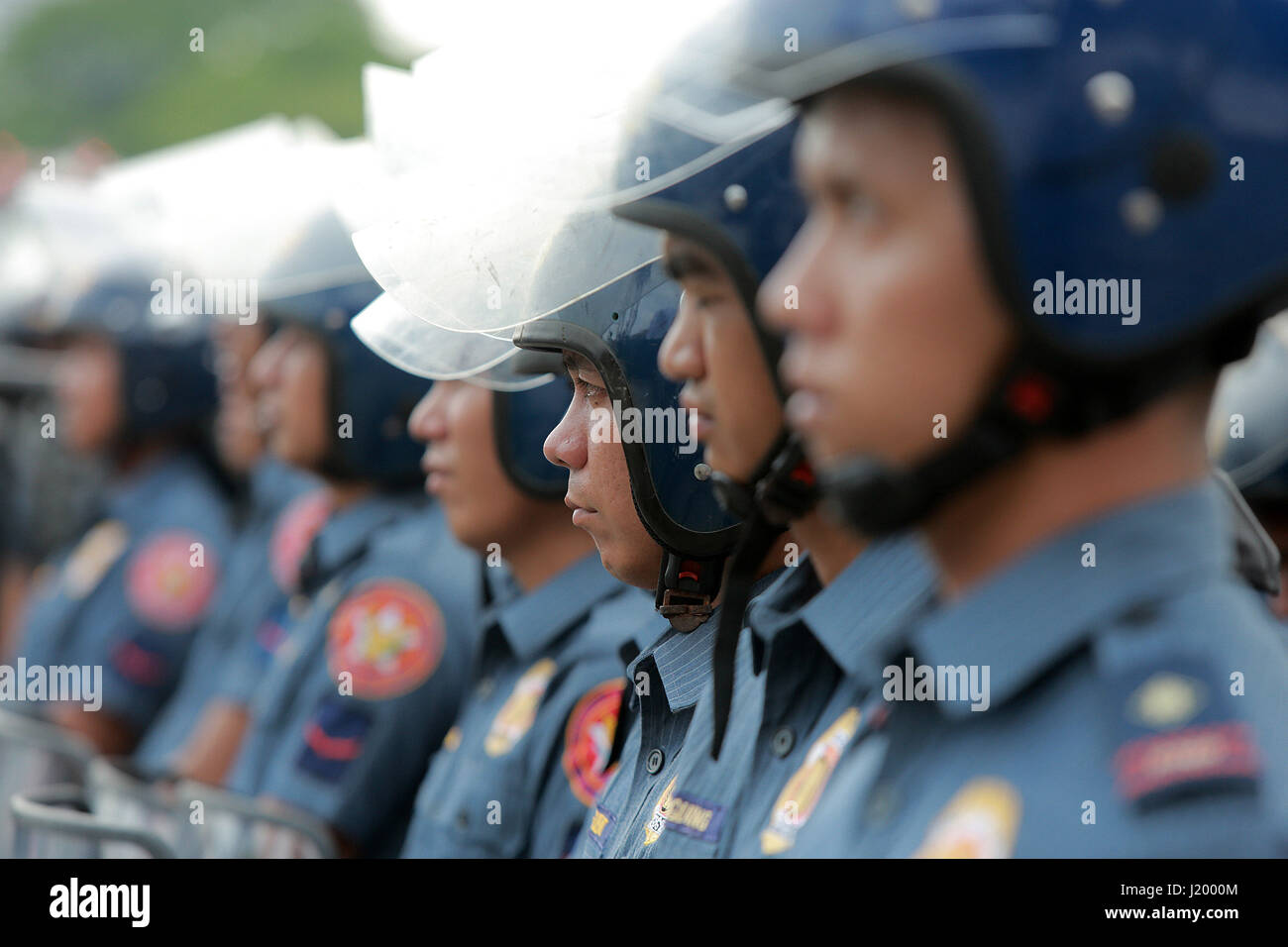 Manila, Philippines. 23rd Apr, 2017. Uniformed personnel attend the ...