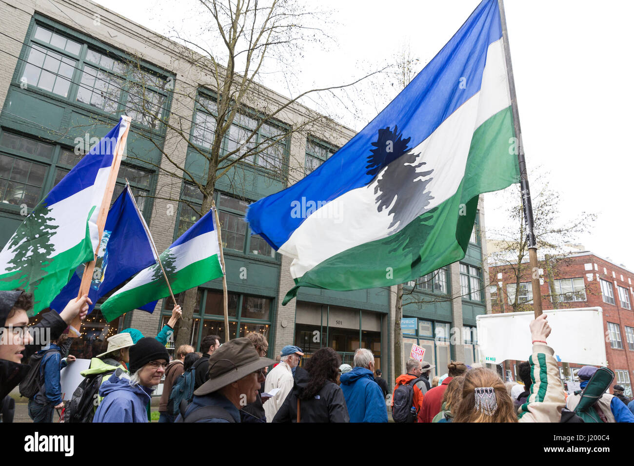 Seattle, Washington,USA. 22nd April, 2017. Protestors carry Cascadia ...