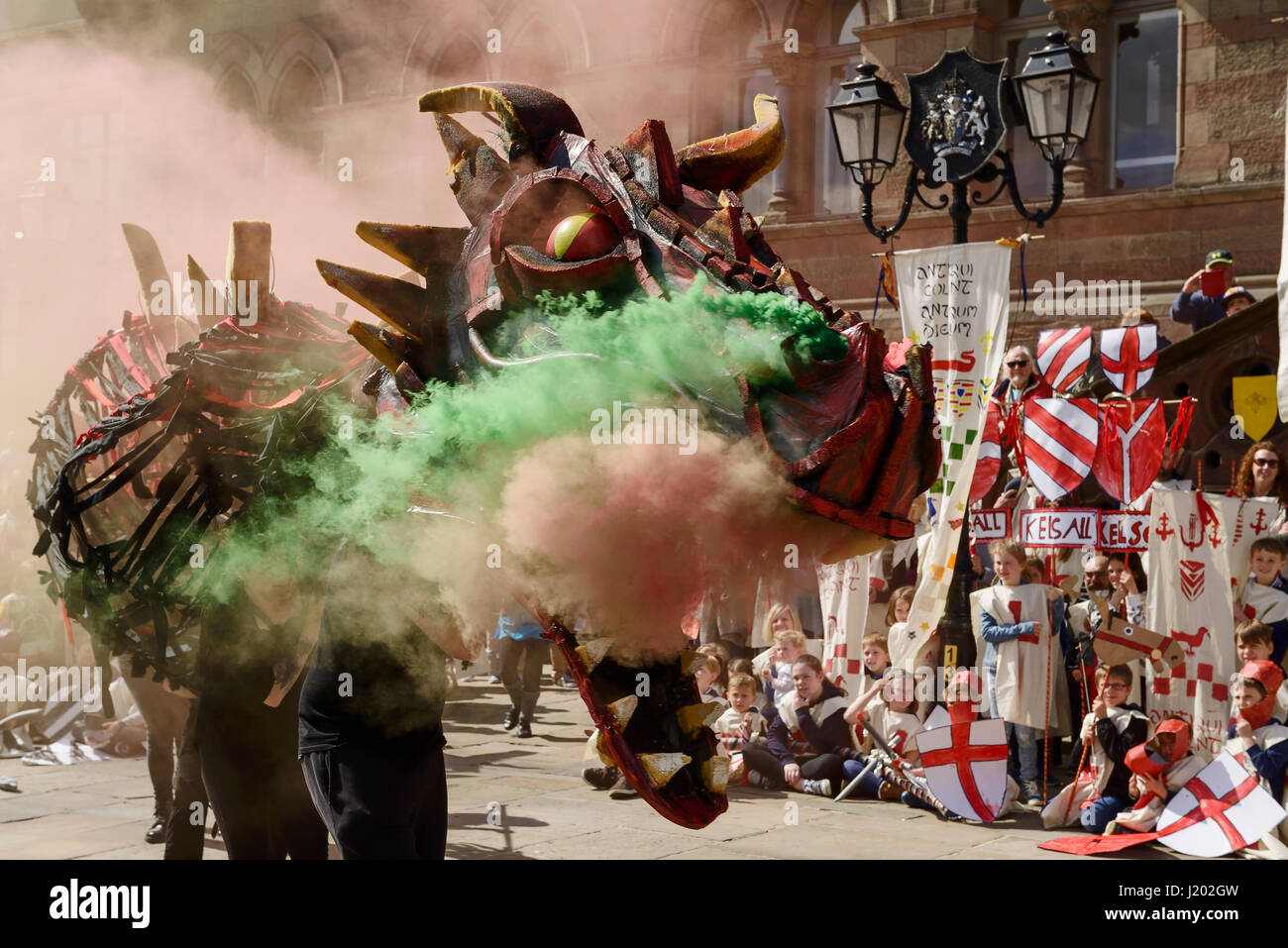 Chester, UK. 23rd April 2017. A smoke breathing dragon makes an ...