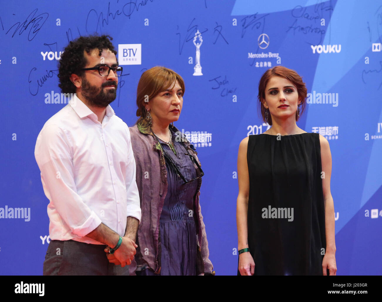 Beijing, China. 23rd Apr, 2017. Crew of the movie Luka pose on the red ...