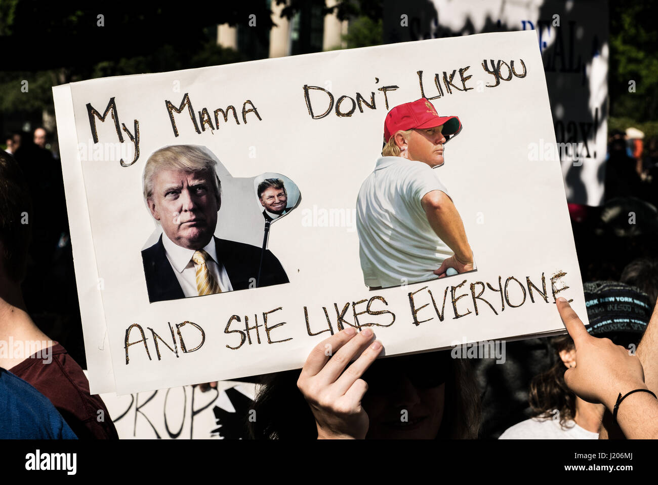 Protesters hold signs high at the Raleigh March for Science held on ...