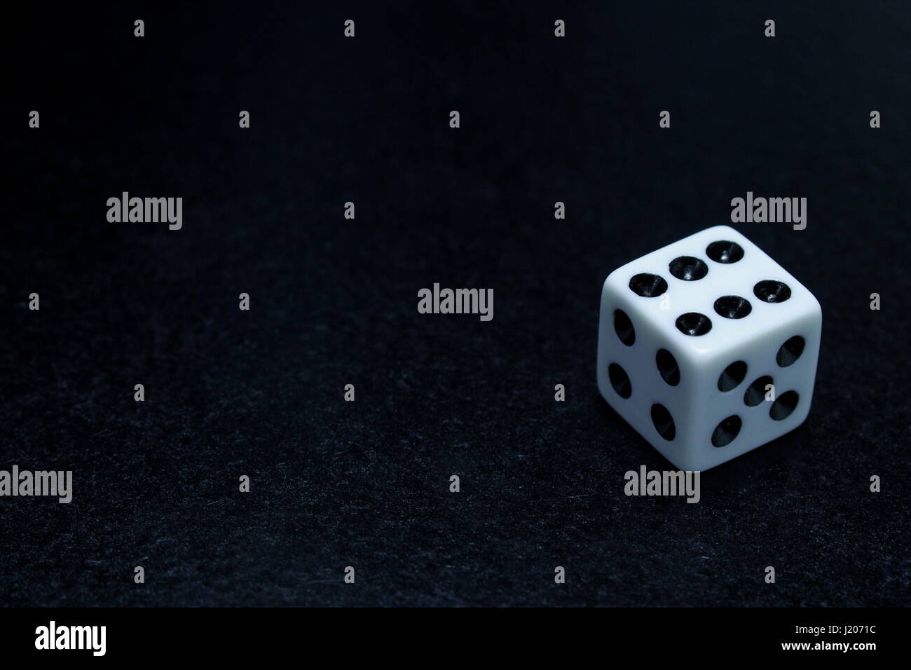 Black background dice hi-res stock photography and images - Alamy