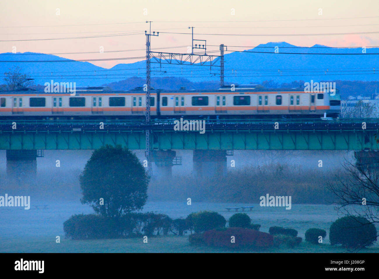 Chuo Line Train on Tama River Tachikawa Tokyo Japan Stock Photo - Alamy