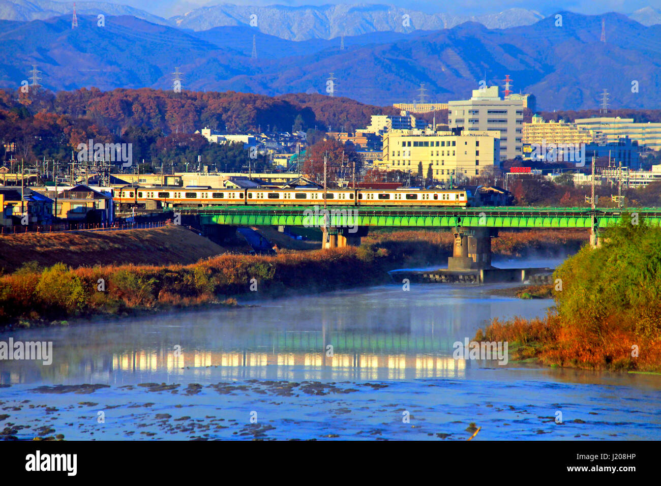 Chuo Line Train on Tama River Tachikawa Tokyo Japan Stock Photo - Alamy