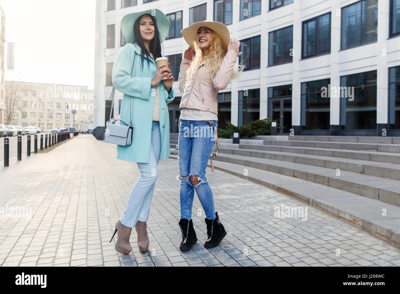 Portrait of girls at building Stock Photo - Alamy