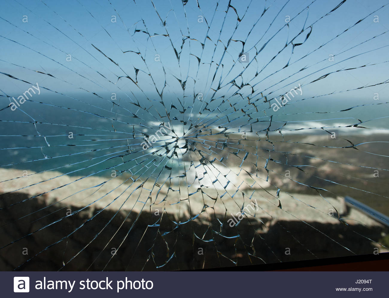 Bullet Hole Glass Window Stock Photos & Bullet Hole Glass Window Stock ...
