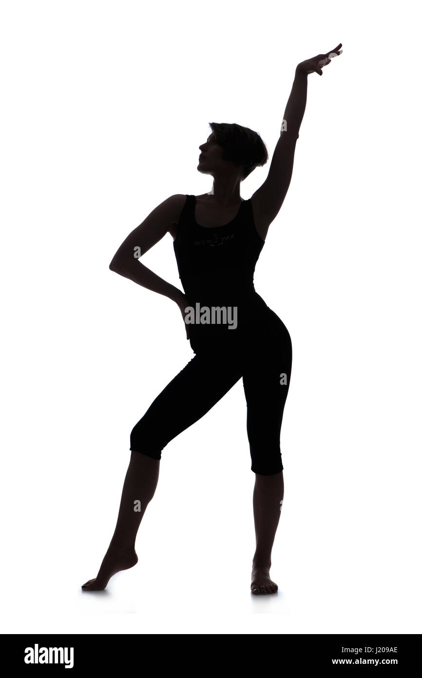 Dancing woman on white background Stock Photo - Alamy