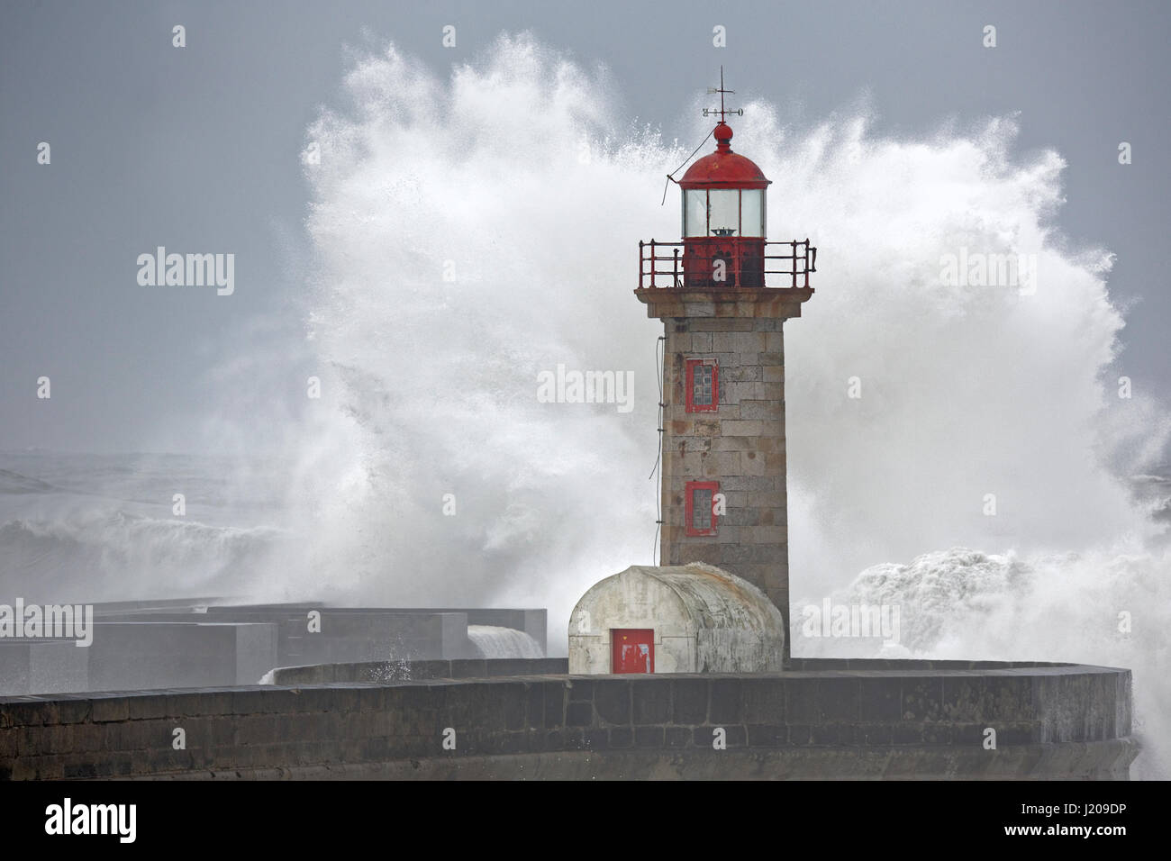 Lighthouse of Porto with storm, Portugal, Europe Stock Photo - Alamy
