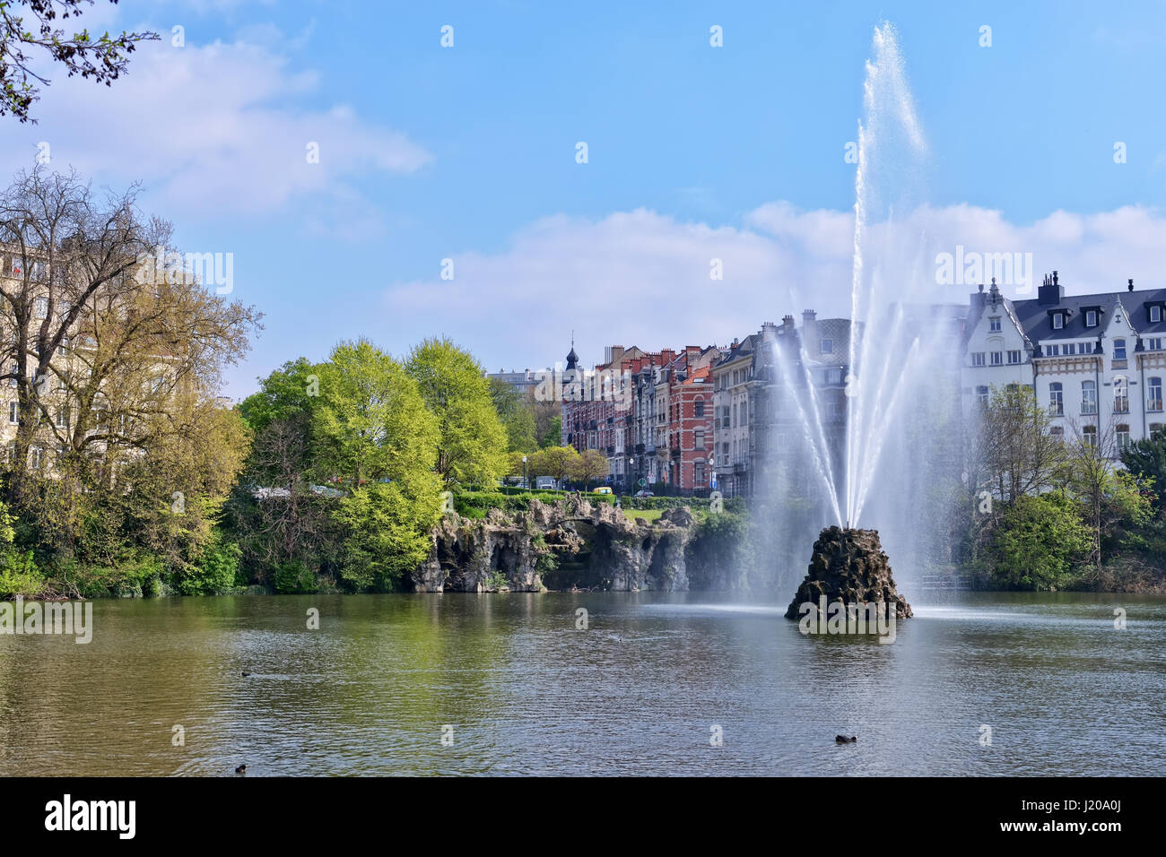 Fountain and artificial grotto decorating a pond on Marie-Louise Square ...