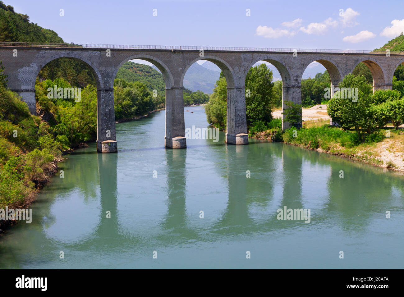Bridge and river in the alps in France Stock Photo - Alamy
