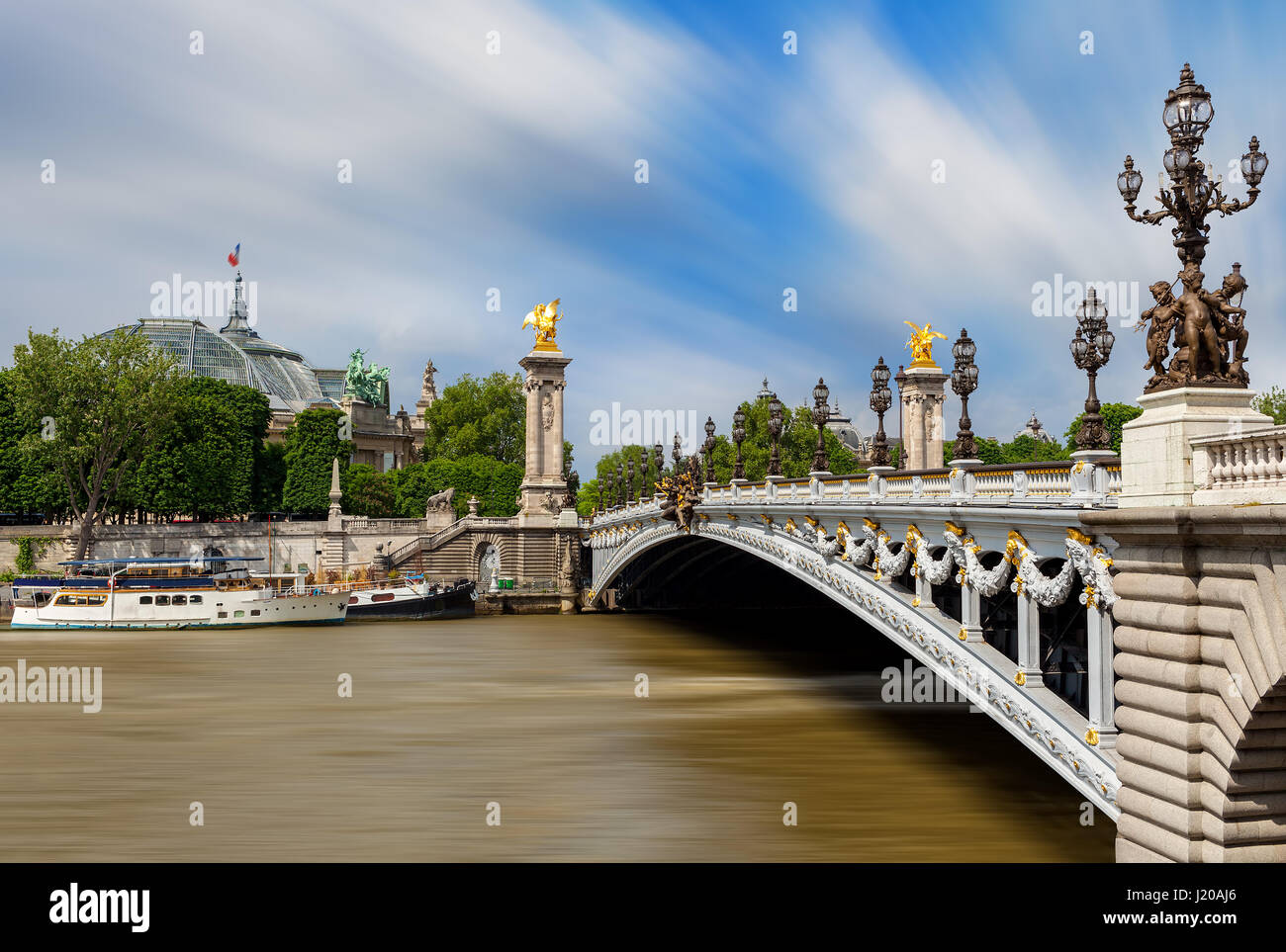 View of famous Alexander the III bridge over Seine river in Paris ...
