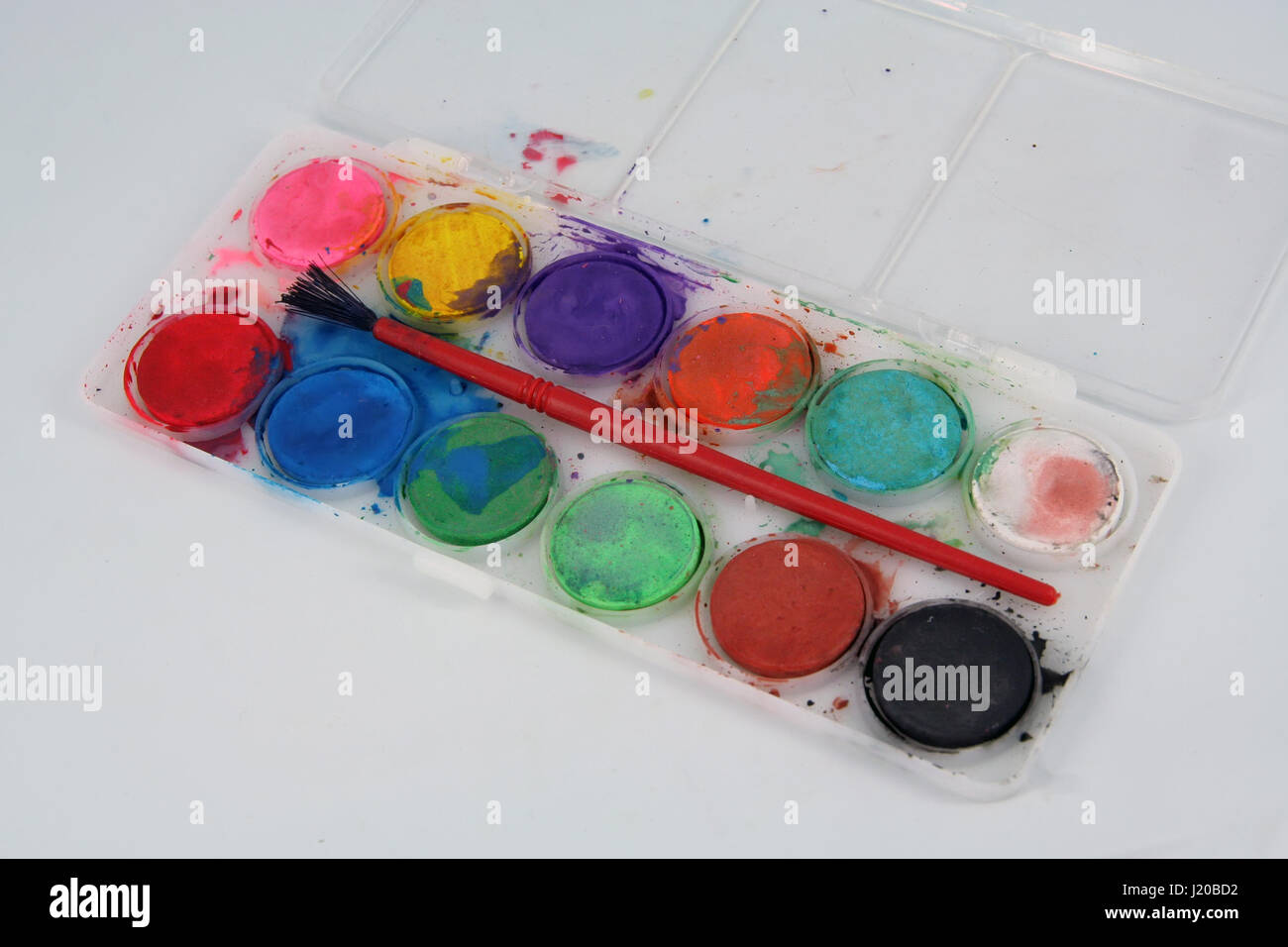 Painting watercolors. Kids watercolors Stock Photo - Alamy