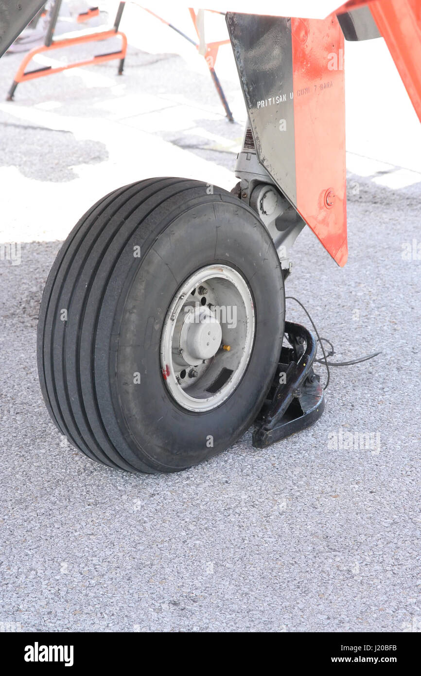 Airplane wheel. Small military jet wheel Stock Photo - Alamy
