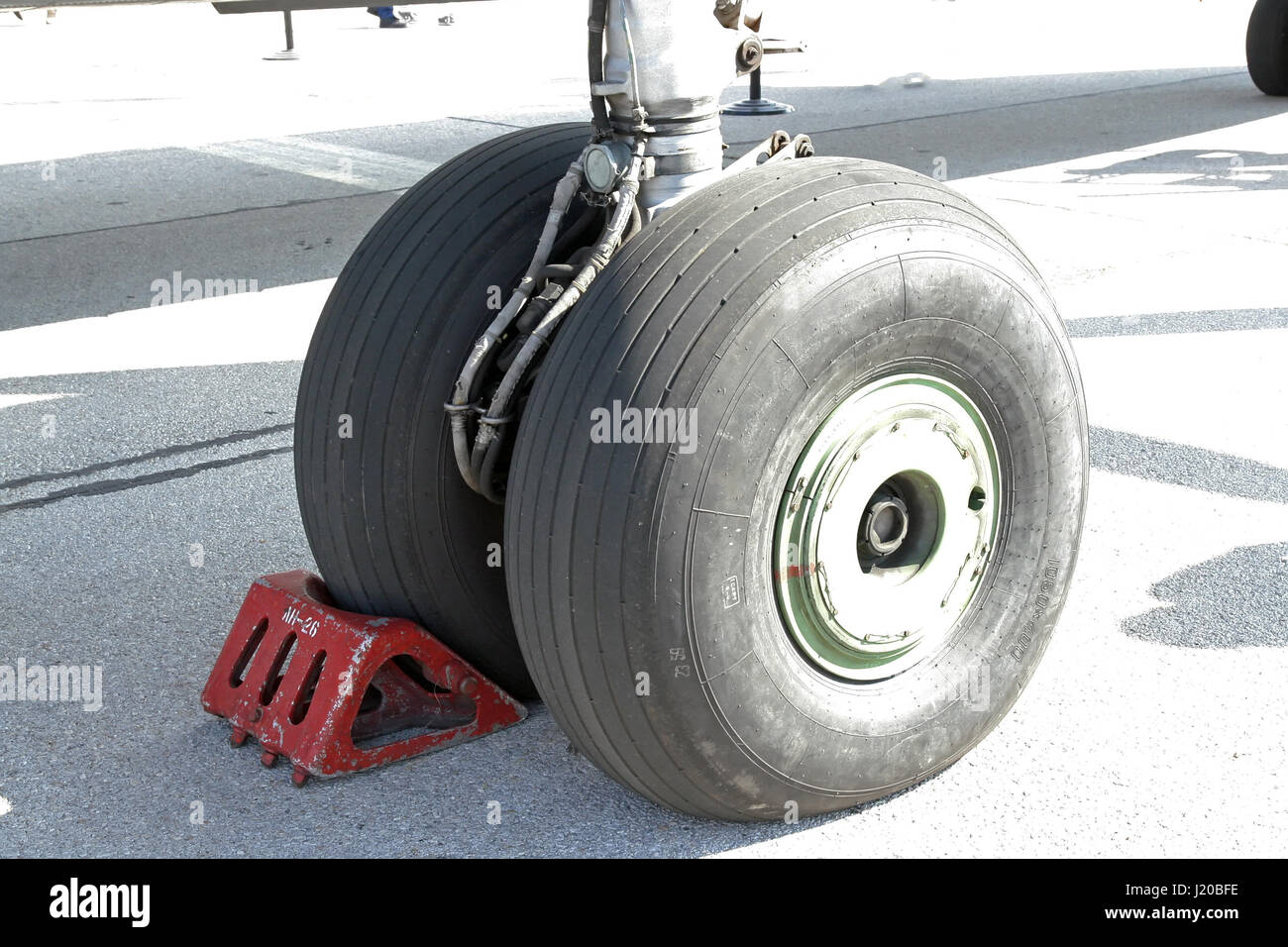Airplane wheel. Small military jet wheel Stock Photo - Alamy
