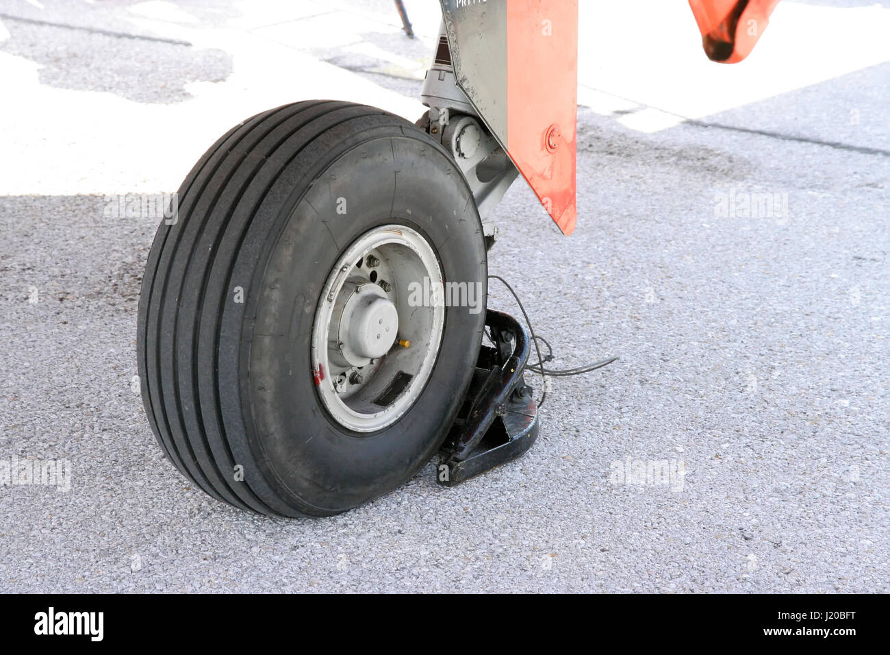 Airplane wheel. Small military jet wheel Stock Photo - Alamy