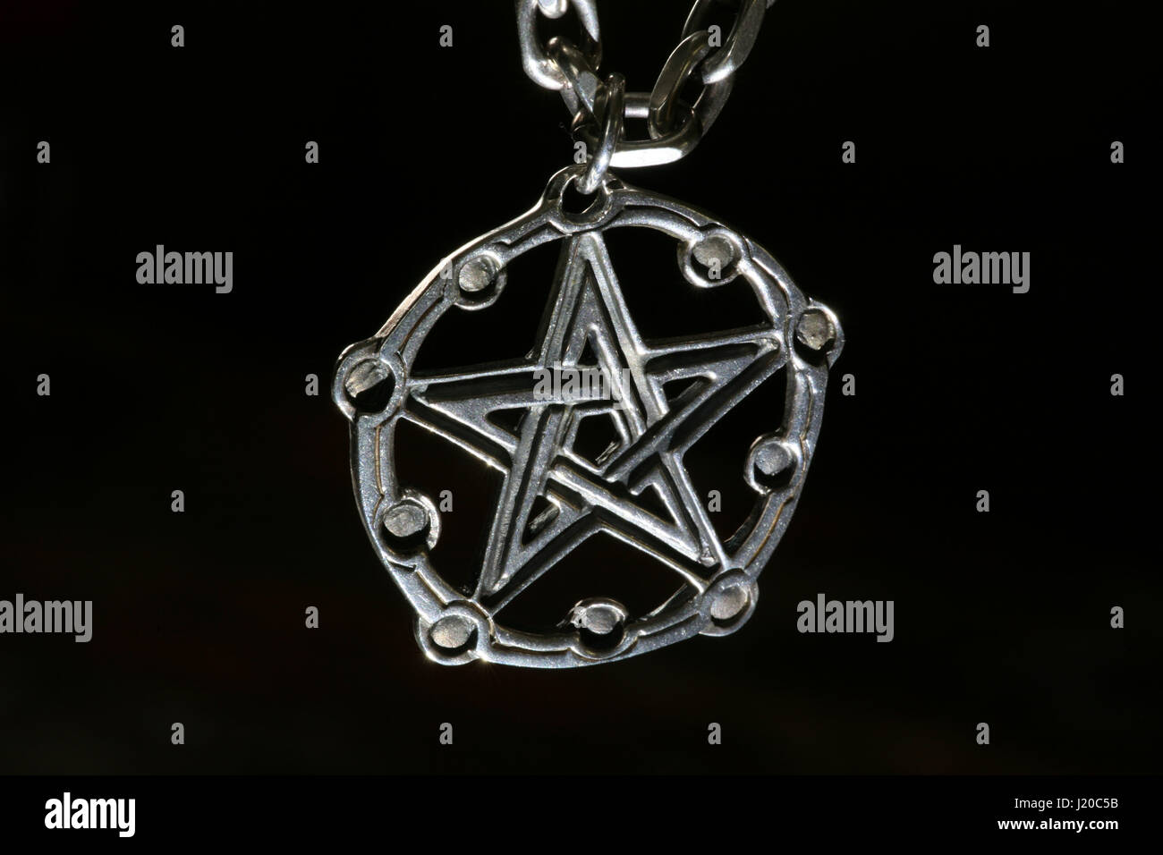 Silver pentagram medallion hi-res stock photography and images - Alamy