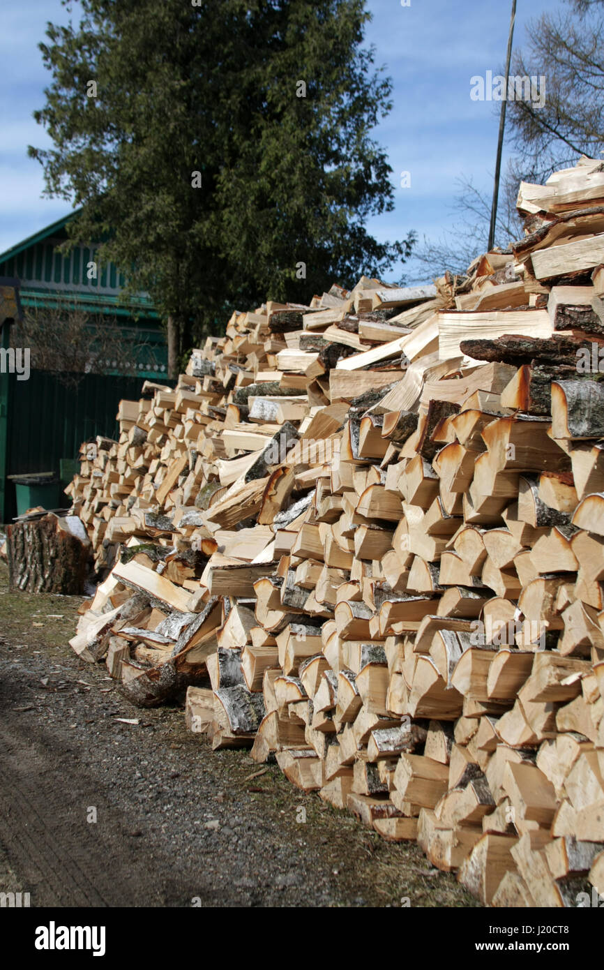 stack of wood harvested for heating rural houses Stock Photo - Alamy